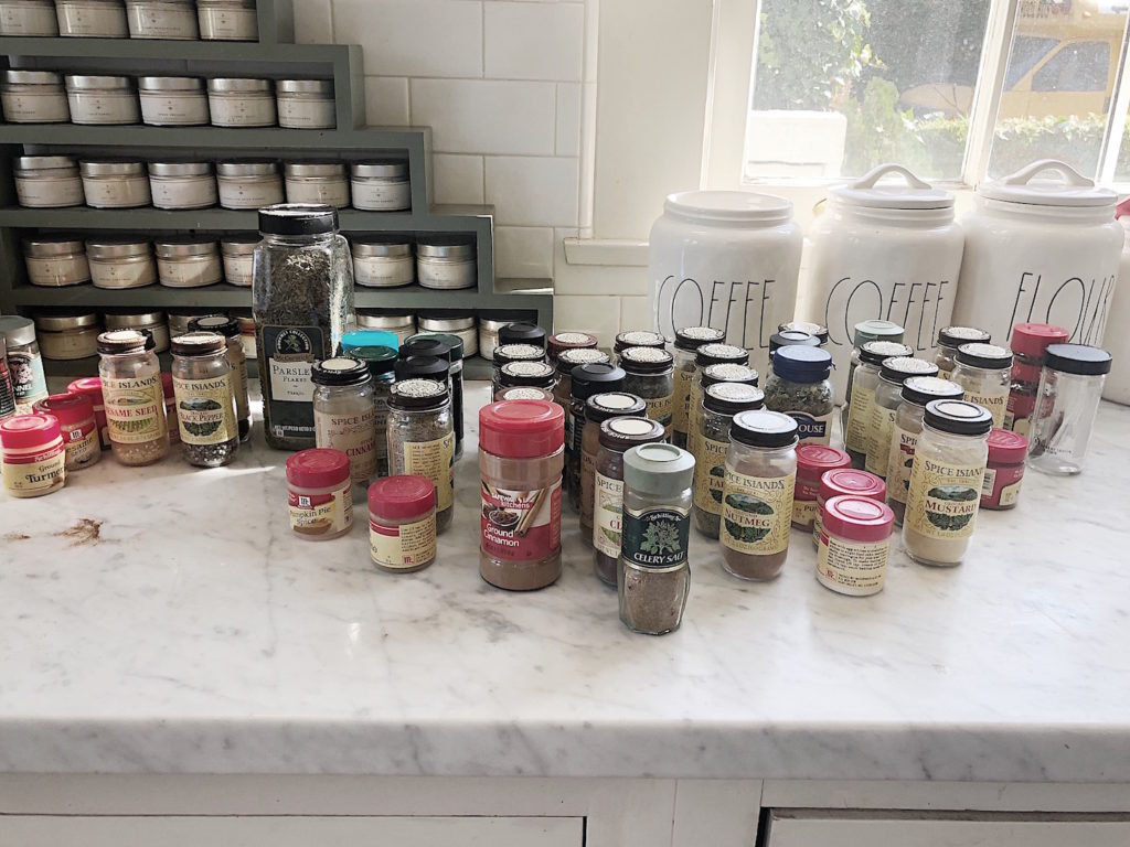 organizing your spice jars and checking expiration dates